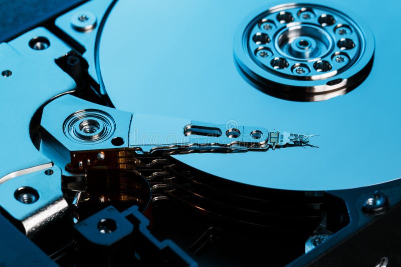A Disassembled Open Hard Disk Drive HDD of a Computer or Laptop Lies on ...