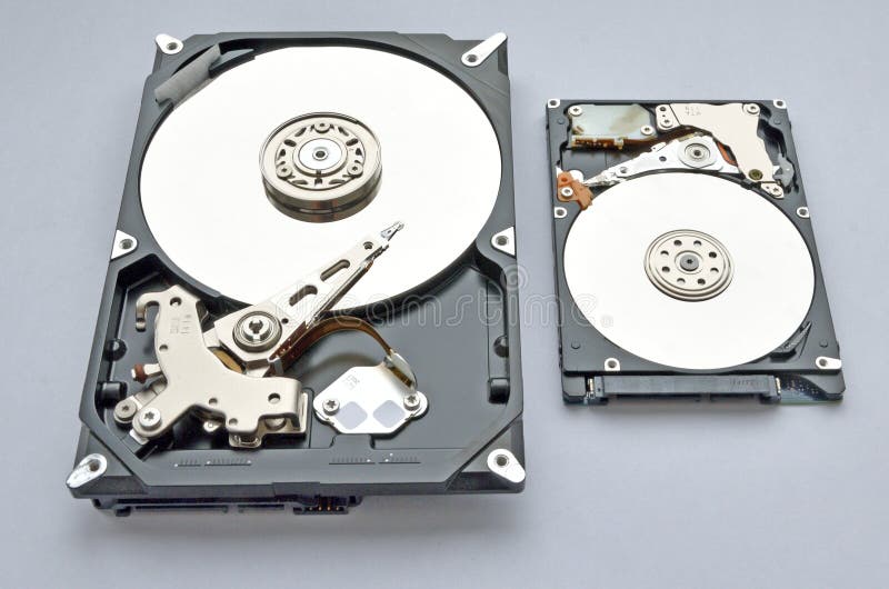 Disassembled Hard Drive for Computer and Laptop on White Background ... Disassembled Hard Drive for Computer and Laptop on White Background ...