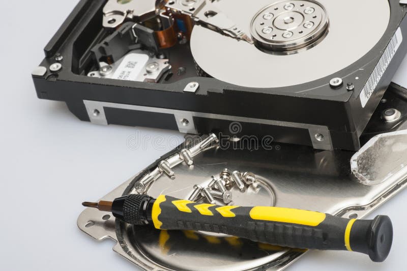 Disassembled Hard Disk There are Plates with Working Surfaces on Which ... Disassembled Hard Disk There are Plates with Working Surfaces on Which ...
