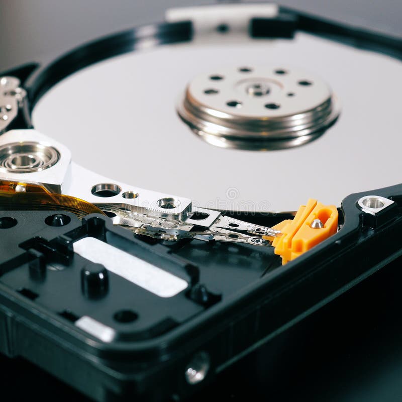A Disassembled Open Hard Disk Drive HDD of a Computer or Laptop Close ...