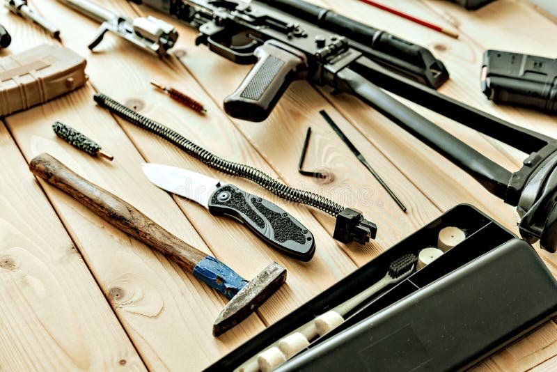 Disassembled Rifle with Cleaning Tools on Table of Weapons Workshop ...