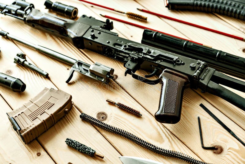 Disassembled Rifle with Cleaning Tools on Table of Weapons Workshop ...