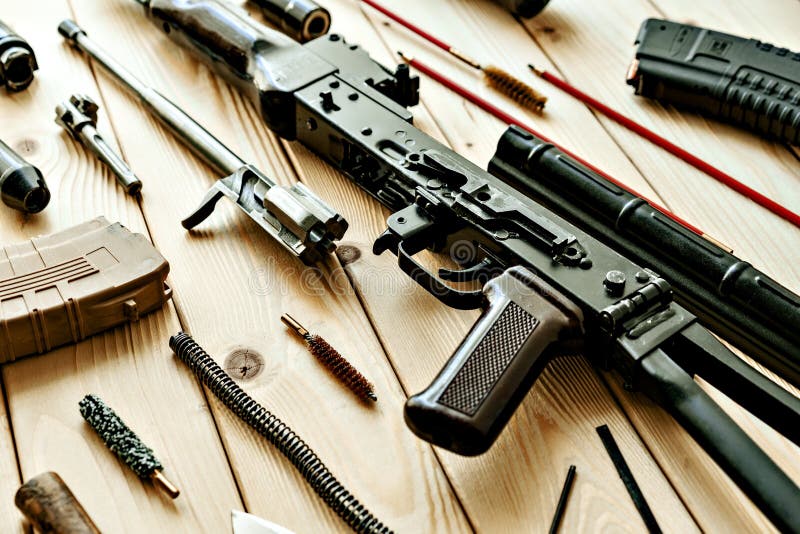 Disassembled Rifle with Cleaning Tools on Table of Weapons Workshop ...