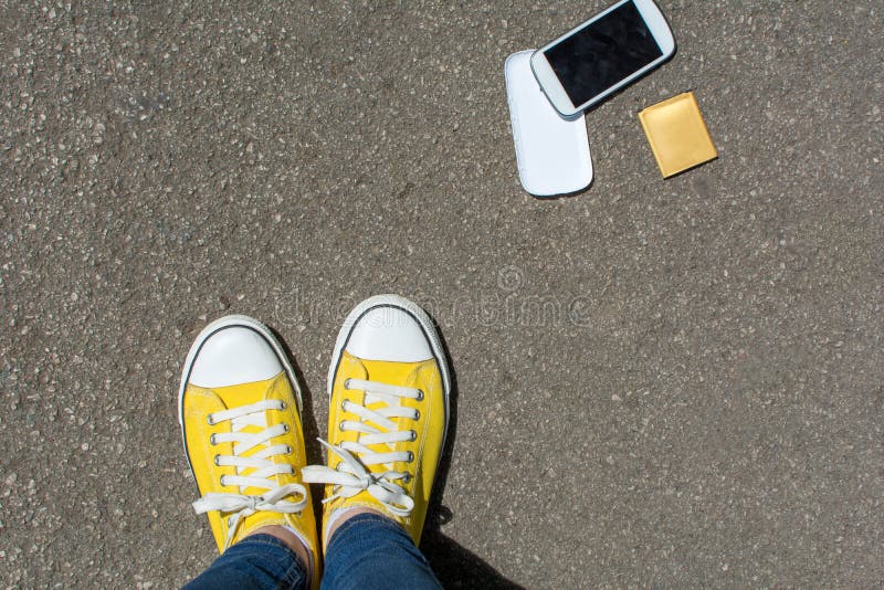 Disassembled Smartphone on the Ground in Front of Person Stock Image ...