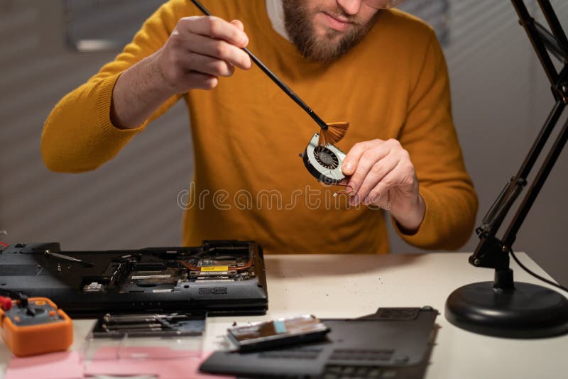 Disassembling and Fixing a Laptop Computer and Cleaning Its Cooling ...