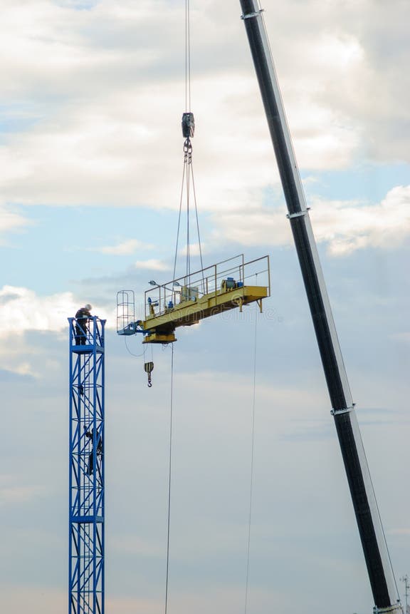 Disassembly of Construction Cranes Using a Lifting Arm with the ...