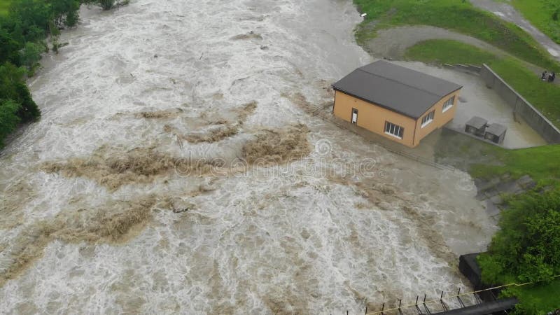 Disaster. Cataclysm. Catastrophe.Fast Flowing Raging River.Swollen ...