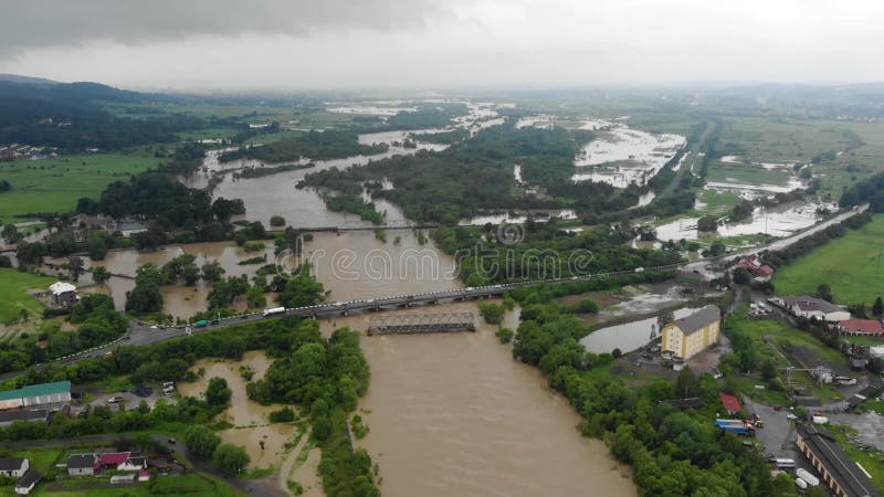 Disaster. Cataclysm. Catastrophe.Fast Flowing Raging River.Swollen ...