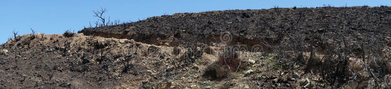 Burned slope of rock stock photo. Image of mountain - 118011084