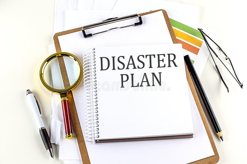 DISASTER PLAN Text on Notebook with Clipboard on White Background Stock ...