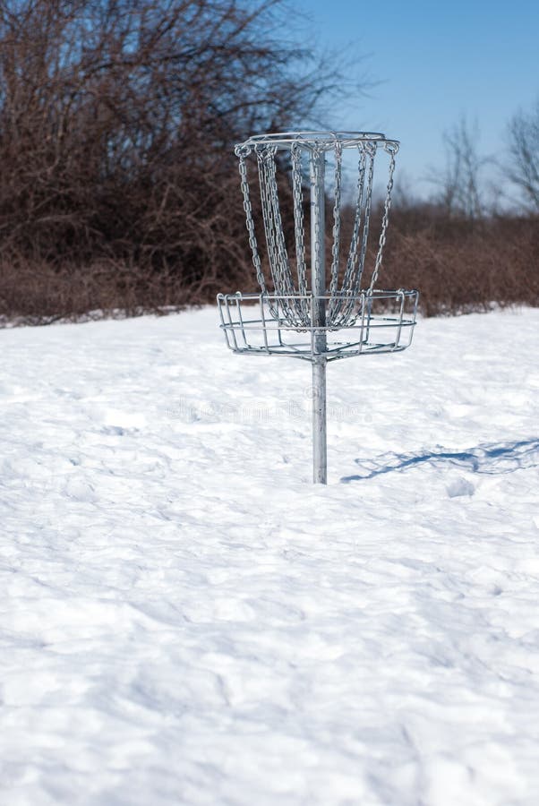 Disc Golf Basket in Snow stock image. Image of chains - 38437579