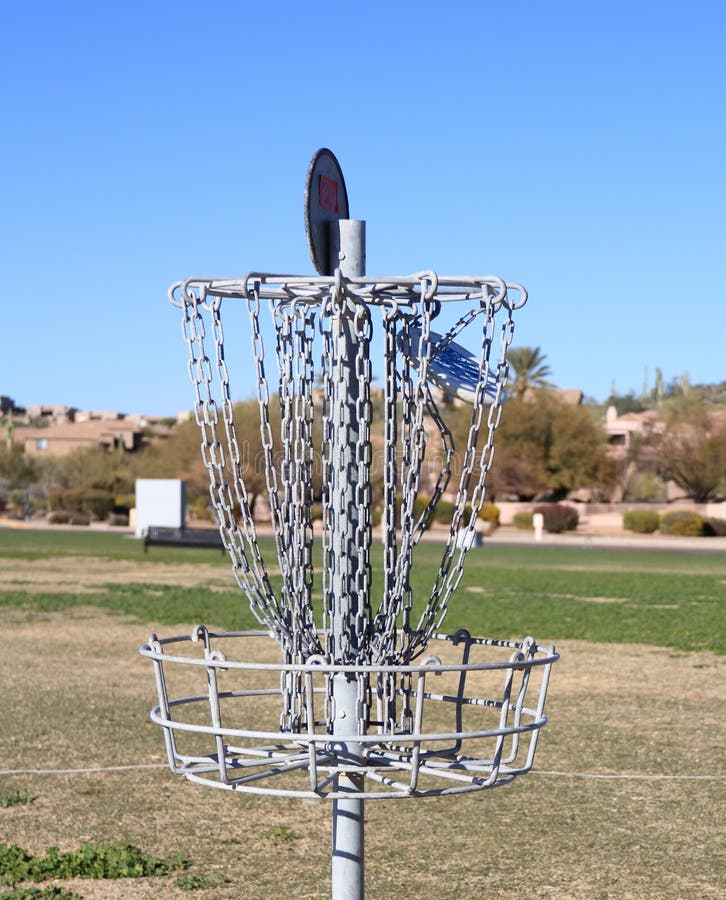 USA: Disc Golf - a Disc Hits the Disc Catcher Stock Photo - Image of ...