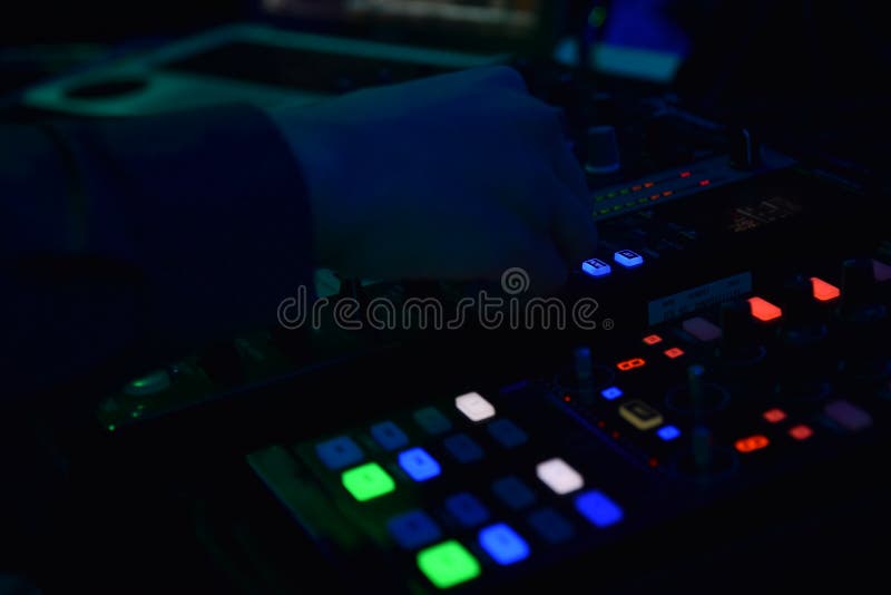 Disc Jockey with Mixing Table Take Controls Stock Photo - Image of blue ...
