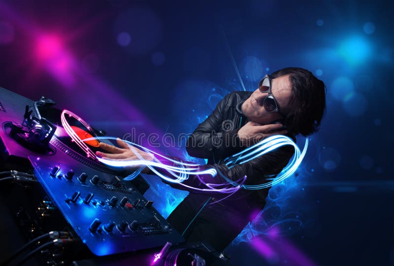 Disc Jockey Playing Music with Electro Light Effects and Lights Stock ...