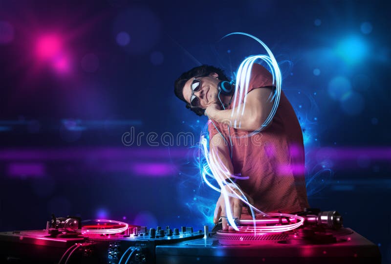 Disc Jockey Playing Music with Electro Light Effects and Lights Stock ...