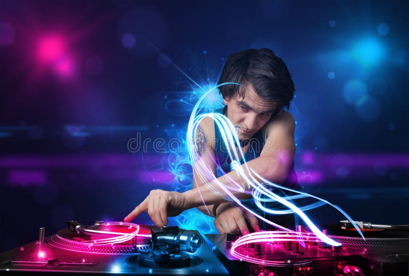 Disc Jockey Playing Music with Electro Light Effects and Lights Stock ...