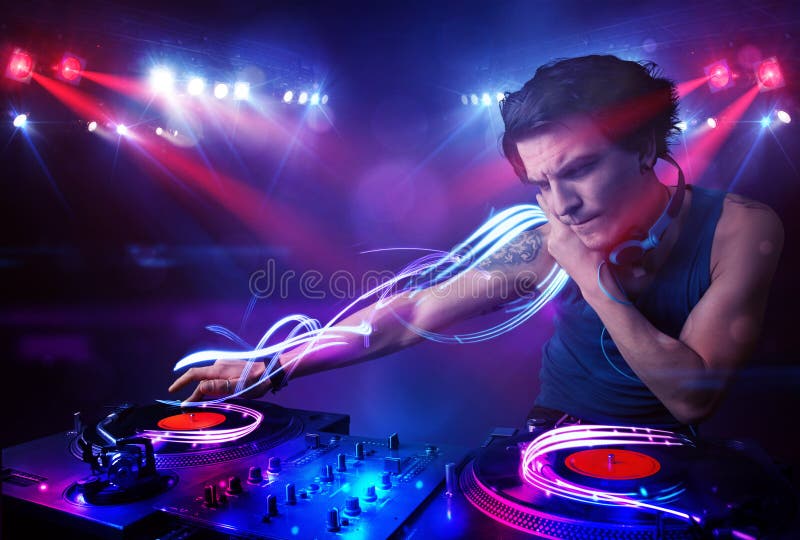 Disc Jockey Playing Music with Light Beam Effects on Stage Stock Image ...