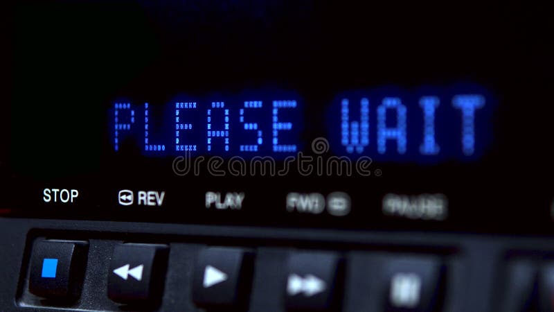 Disc Player with Screen. the Word Please Wait is Written on the Screen ...