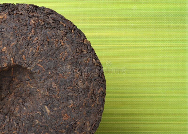 Disc Of Puer Tea On Green Background Stock Photo - Image of asian ...