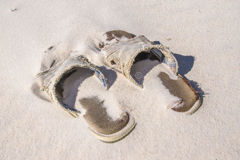 Discarded Beach Sandals3 stock image. Image of sand, beach - 83404993