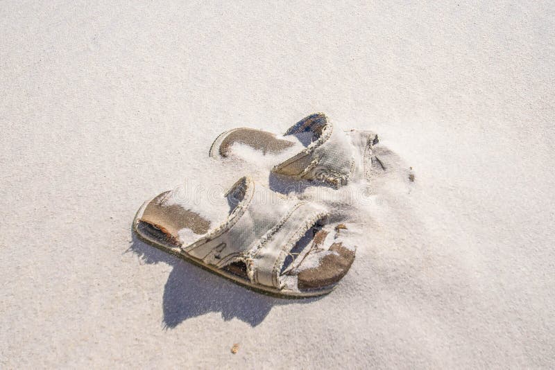 Discarded Beach Sandals stock photo. Image of sandals - 83404982