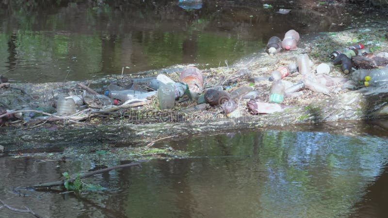 Discarded Garbage on Surface of Calm River, Problem of Water Pollution ...