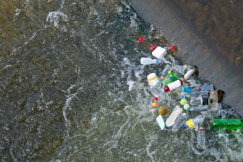Collection of Discarded Trash in Water Stock Photo - Image of ...