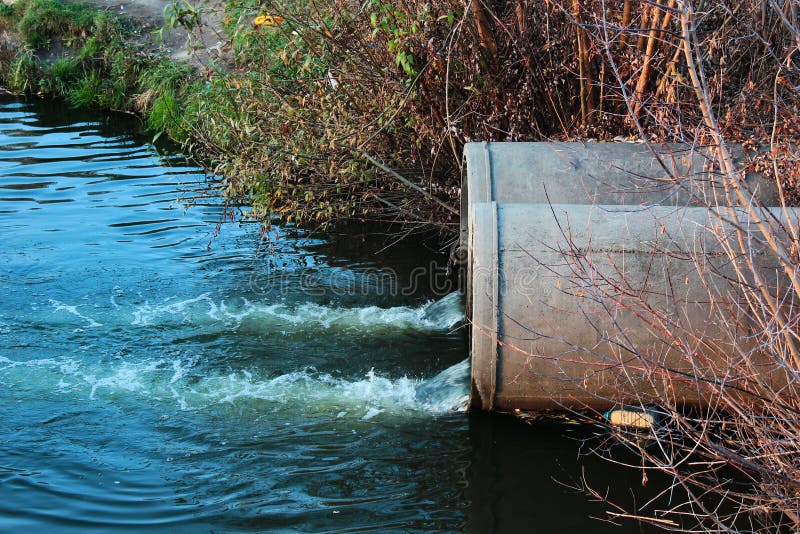 Discharge of Sewage into a River Stock Photo - Image of environmental ...