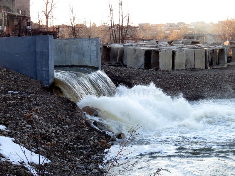 Discharge of Water on a Rural Dam Stock Photo - Image of rural, relief ...