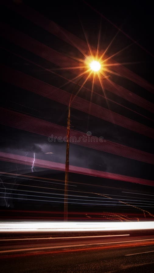 Discharges of Lightning in the Night Sky Over the Road Stock Photo ...