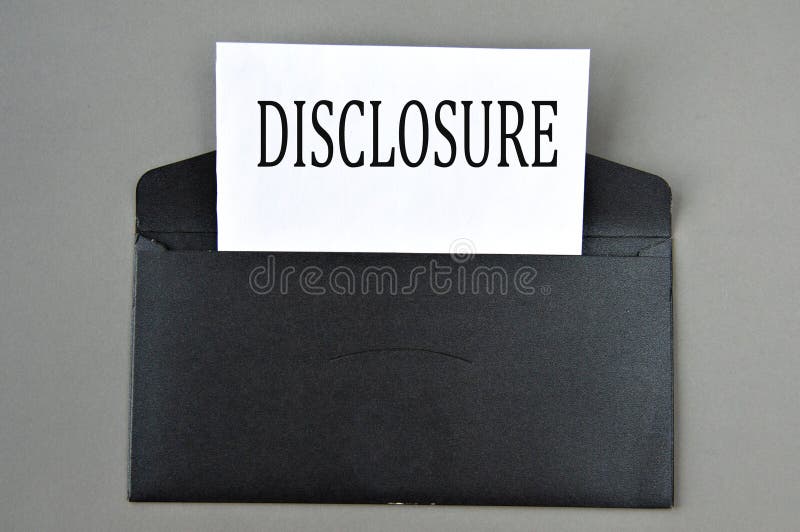 DISCLOSURE - Word on White Paper on a Black Envelope with a Magnifying ...