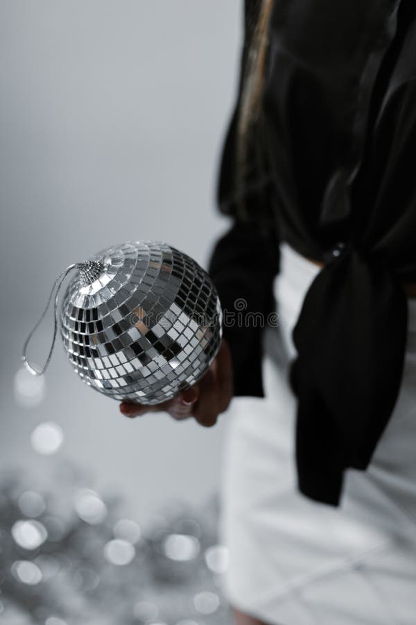 Disco Ball in Attractive Woman Hands. Silver Edition Stock Image ...