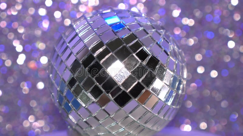 Disco Ball Filmed in the Studio with a Silver Background and Movement ...