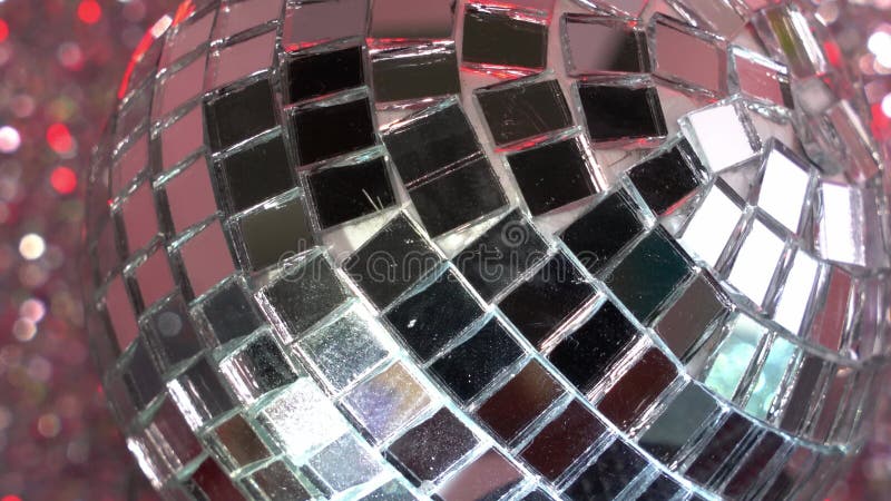 Disco Ball Filmed in the Studio with a Silver Background and Movement ...