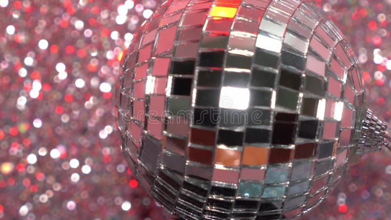 Disco Ball Filmed in the Studio with a Silver Background and Movement ...