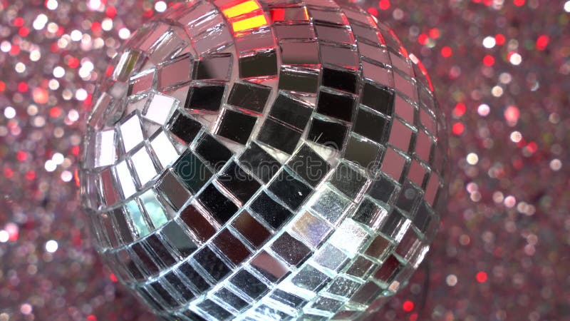 Disco Ball Filmed in the Studio with a Silver Background and Movement ...
