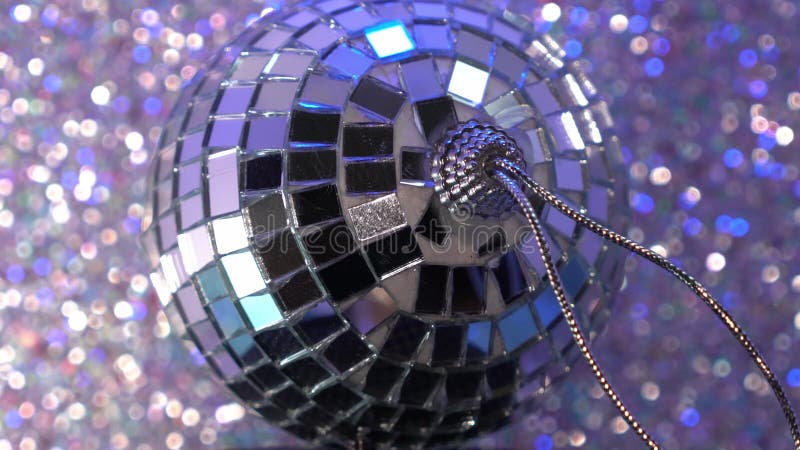 Disco Ball Filmed in the Studio with a Silver Background and Movement ...