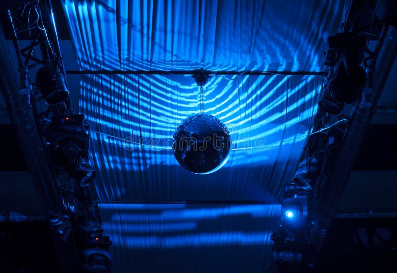 Disco Ball Hanging at Ceiling with Blue Lights Stock Photo - Image of ...