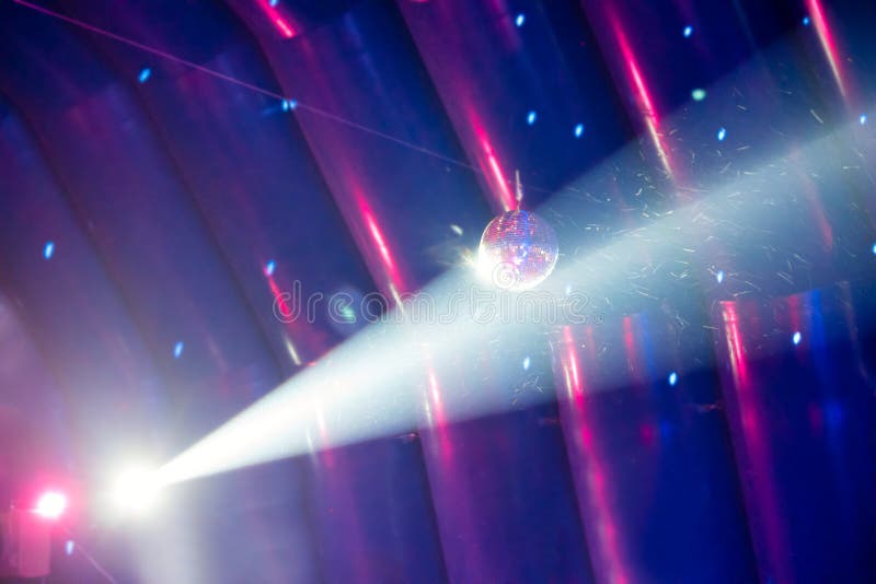 Disco ball and light ray stock photo. Image of laser - 66204206