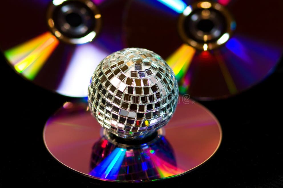 Disco Ball with Music DVDS on Black Stock Image - Image of reflections ...