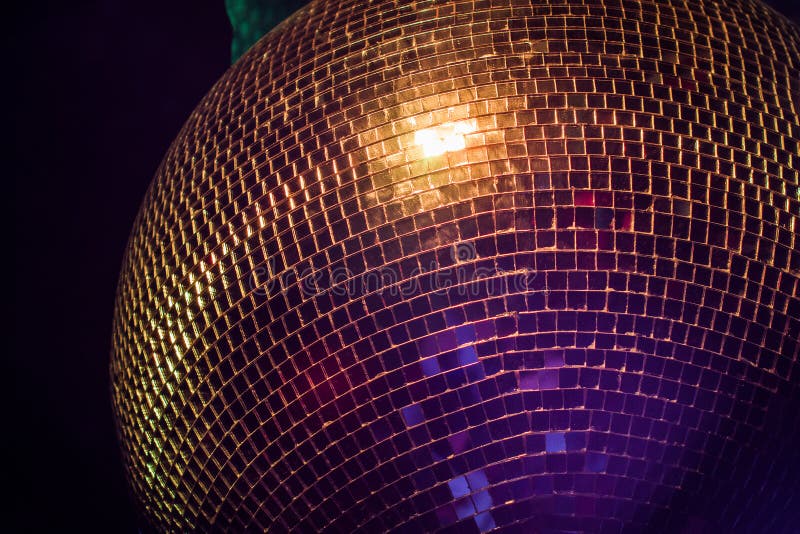 Disco Ball at the Party. Beautiful Purple Light, the Rays Reflected ...