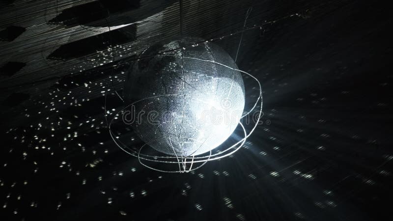 Ball with Reflected Moving Purple Rays Rotating. Disco Ball on Black ...