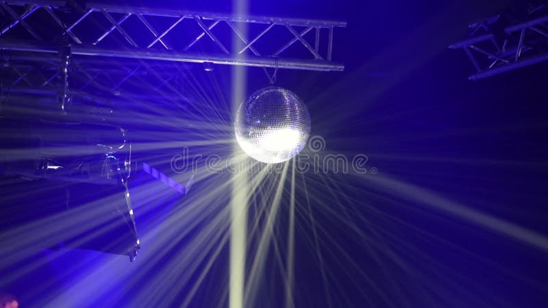 Disco Ball Reflecting Beams of Light in a Studio Setting. Stock Video ...
