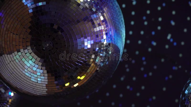 A Disco Ball Suspended from the Ceiling Rotates Quickly, Light Rays and ...