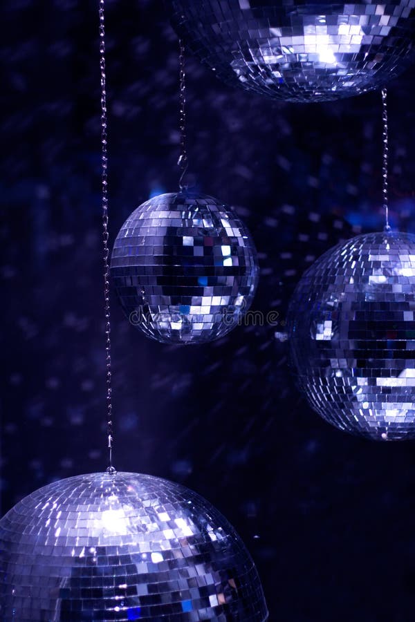 Disco Balls, Mirror Balls Hanging Outside in the Garden.. Stock Photo ...