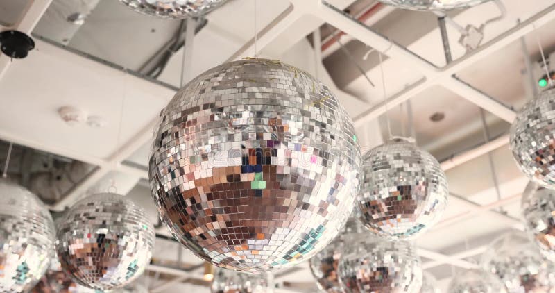 Disco Balls are Spinning Under the Ceiling at the Event. Event ...