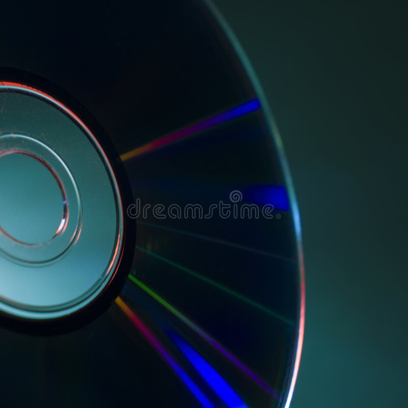 Disco Compacto Sobre Fundo Azul Foto de Stock - Imagem de marrom, azul ...
