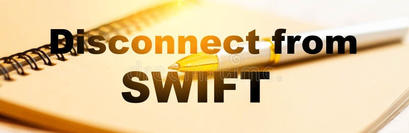 Disconnect from SWIFT. Text on the Background of a Notepad in the ...