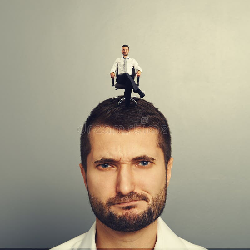 Discontented Man with Happy Man on the Head Stock Photo - Image of ...