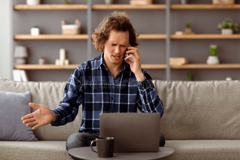 Discontented Man Talking on Phone Having Problem at Home Stock Image ...